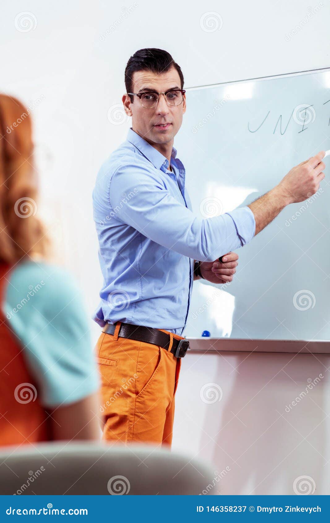 Smart Young Man Explaining the Rule Near the Whiteboard Stock Image ...
