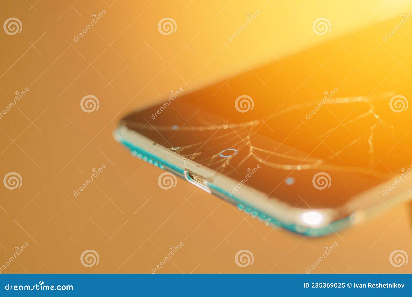 Smartphone with Broken Display Glass in the Solar Light. Cracked Screen ...