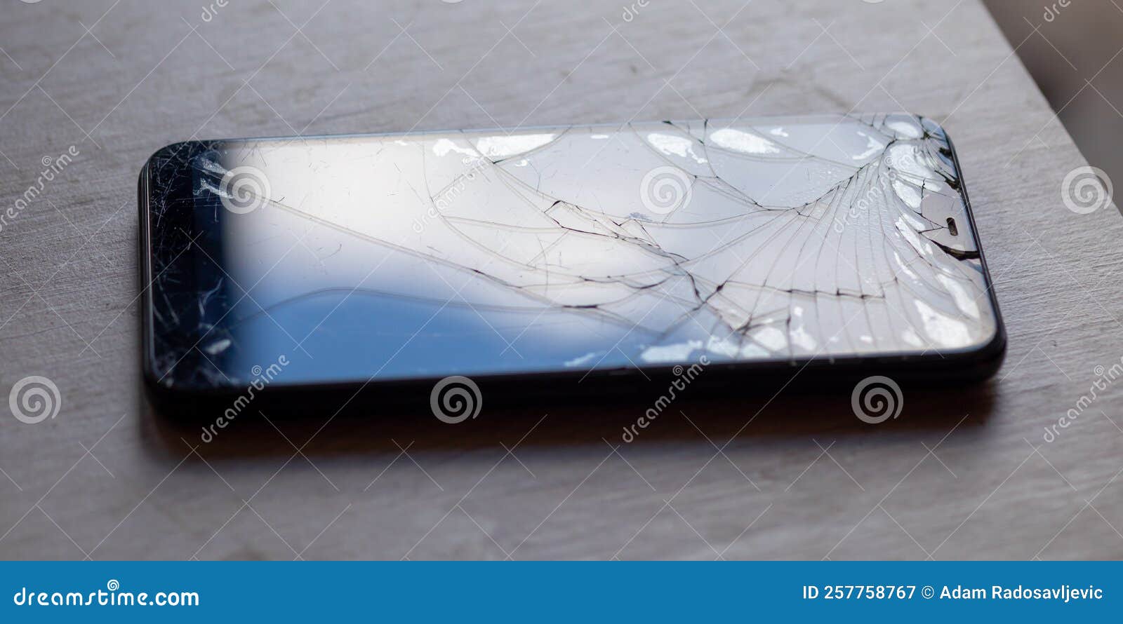 Smartphone with Broken Touchscreen Screen on Table Desktop Stock Image ...