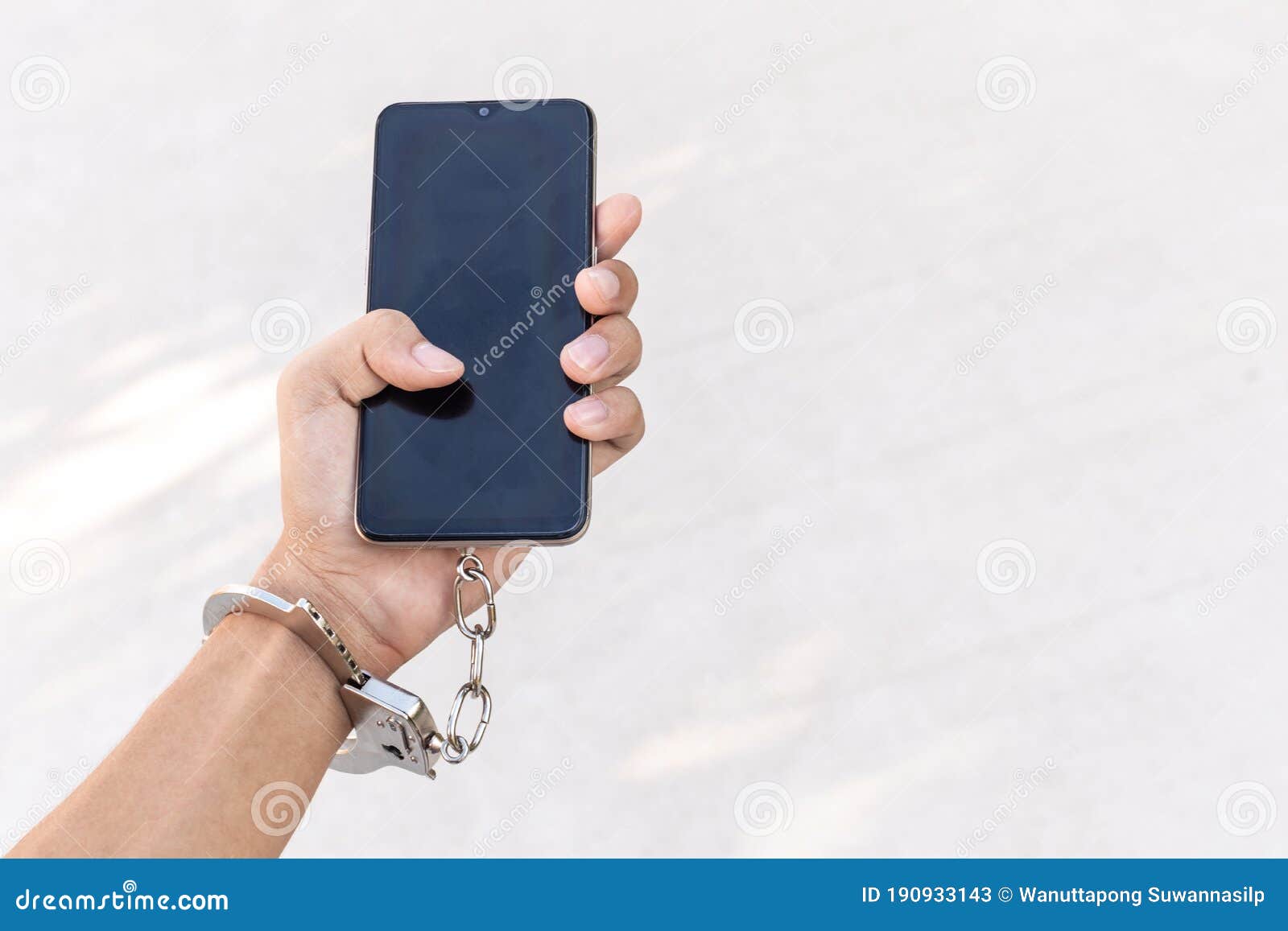 Smartphone Chained To Handcuffed in Hand. Mobile Phone Addiction ...