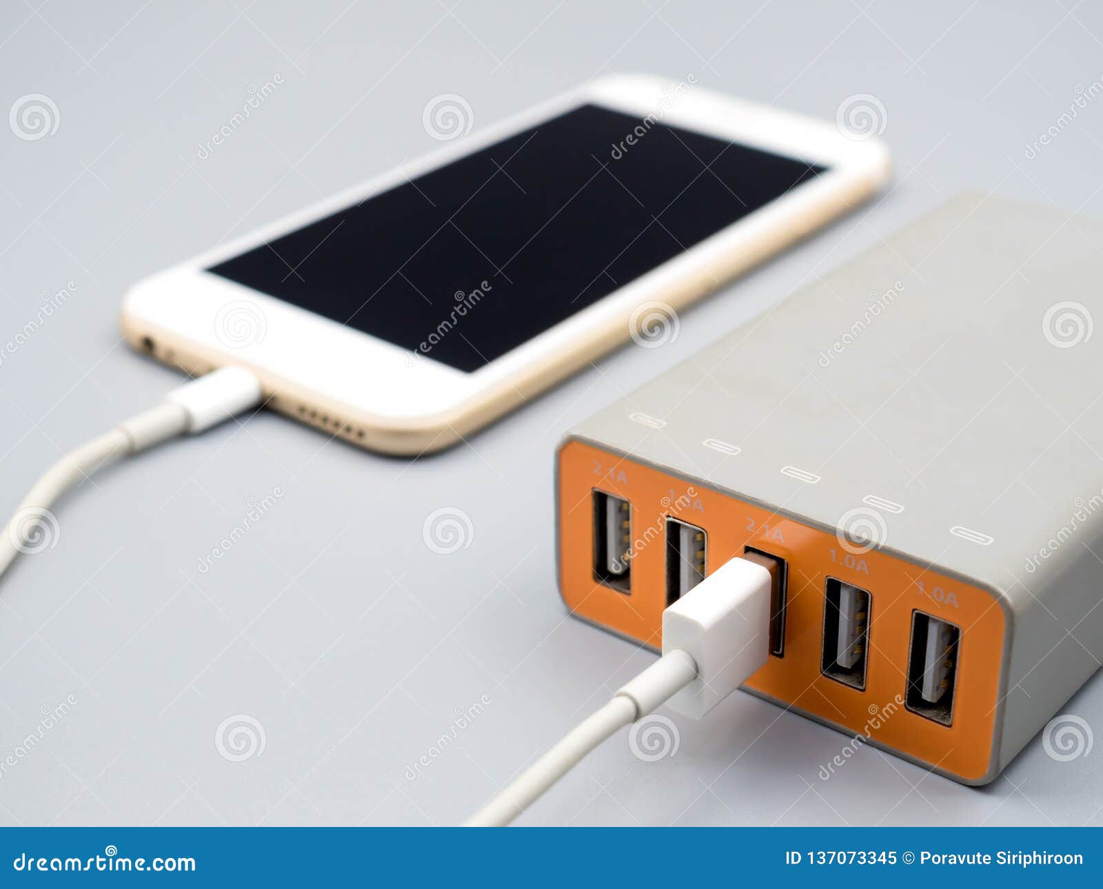 Smartphone Charging with Multiport USB Power Adaptor Stock Image ...