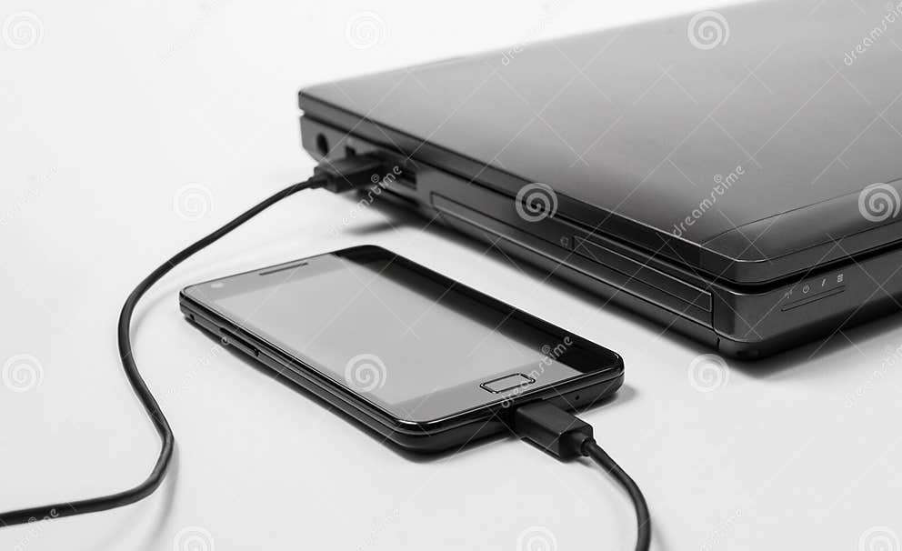Smartphone Charging Power from a Laptop Stock Photo - Image of internet ...