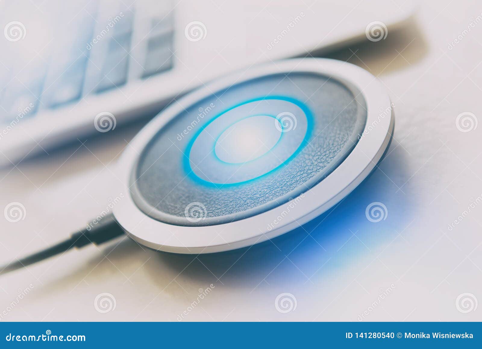 Smartphone Charging on a Wireless Charger Stock Photo - Image of ...