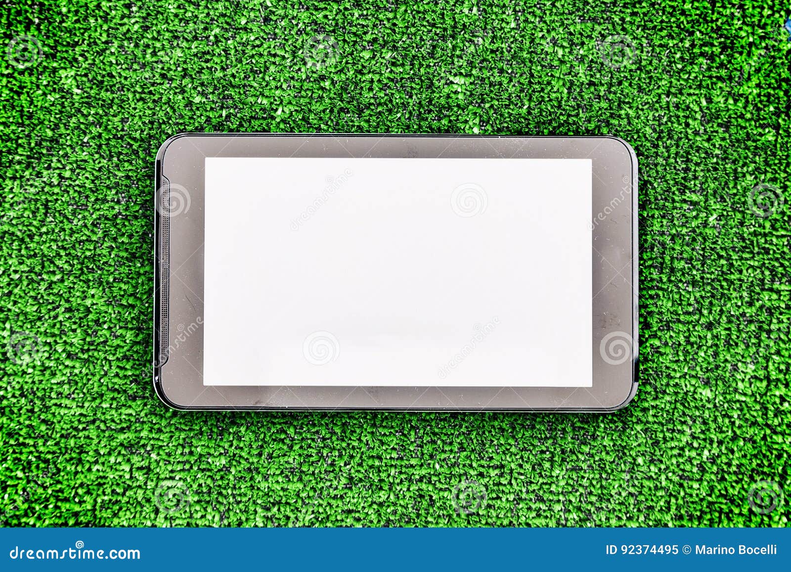Smartphone with Clean Screen on a Grass Background Stock Image - Image ...