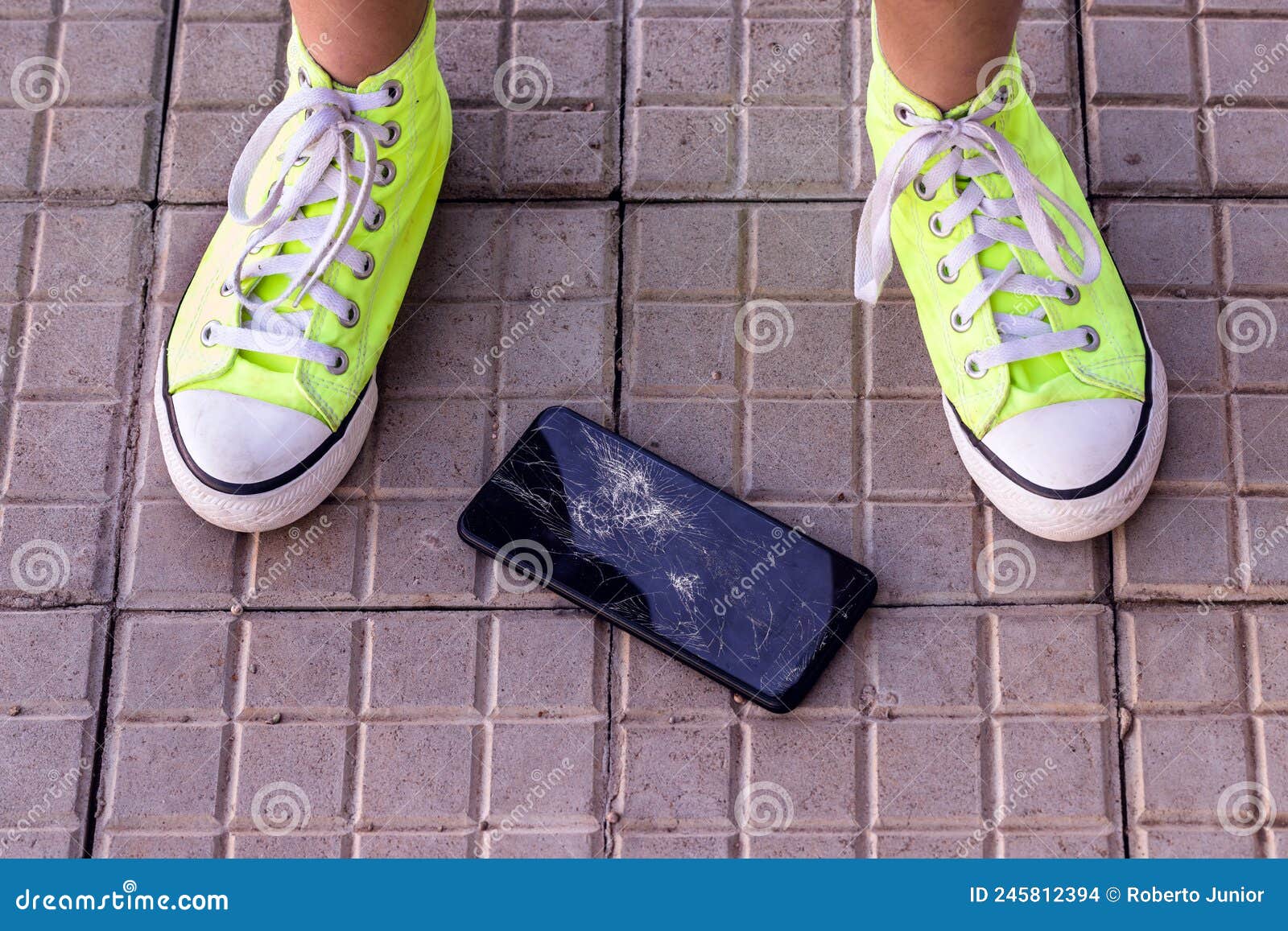 Smartphone Device Dropped on Floor with Broken Screen, Top View ...