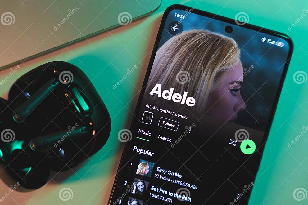 A Smartphone Displaying Adele S Artist Profile on Spotify Editorial Photography - Image of ...