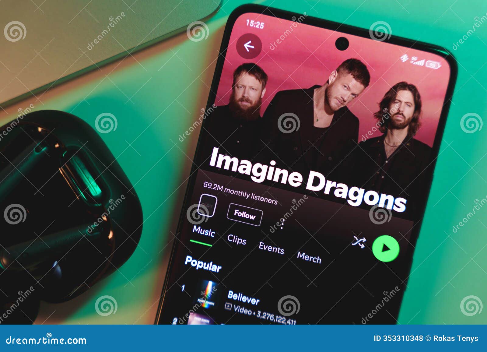 A Smartphone Displaying Imagine Dragons Artist Profile on Spotify ...