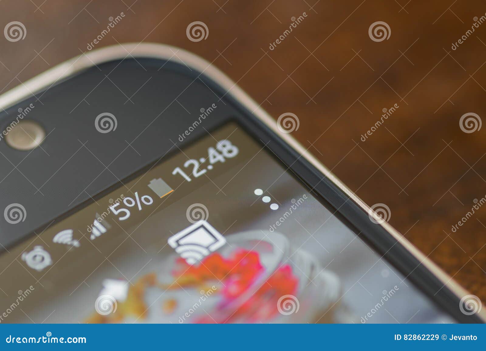 Smartphone with Five Percent Battery Charge on the Screen Stock Image ...