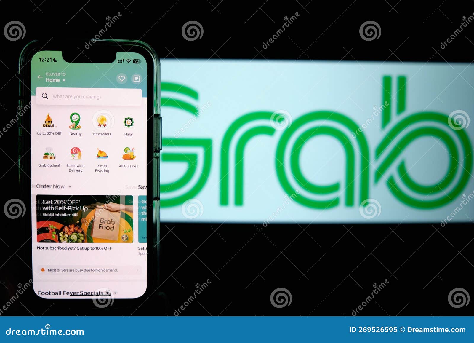 Smartphone with the Grab App in Front of Their Web Page Editorial Image ...