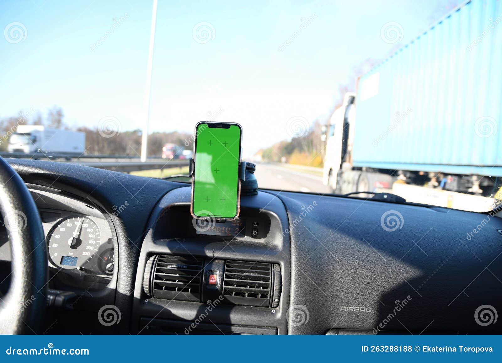Smartphone with Green Screen in Windshield Holder in the Car for ...