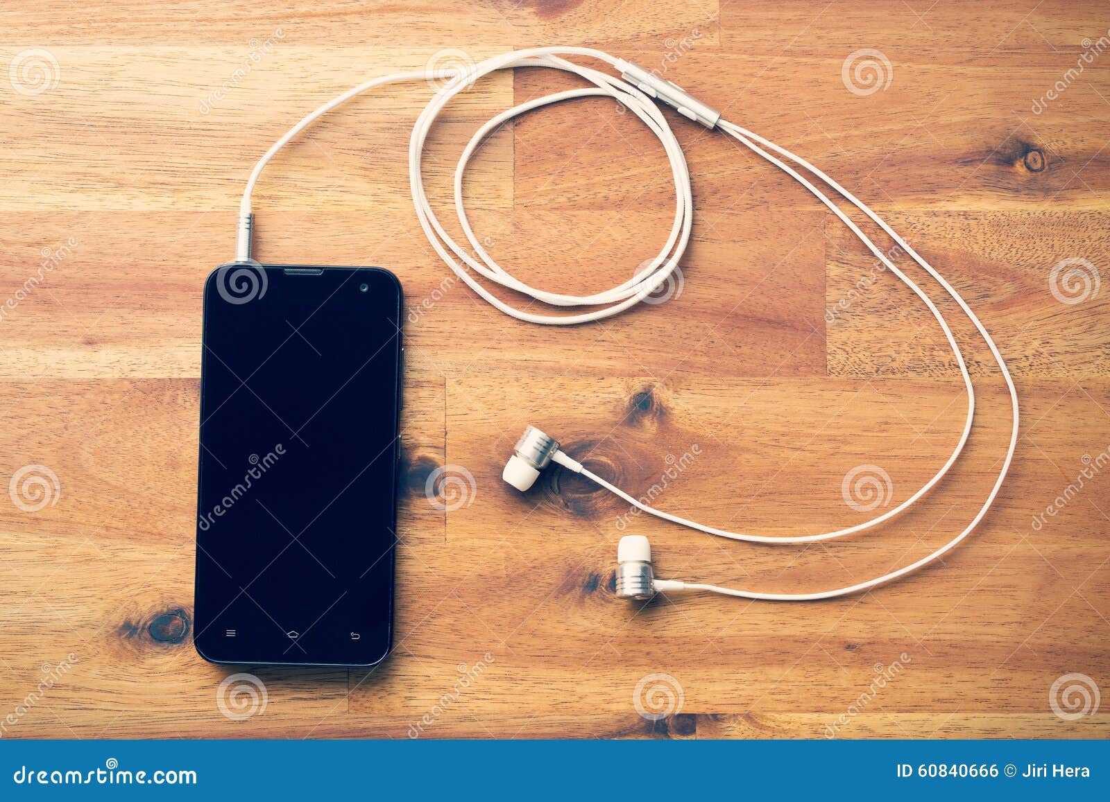 Smartphone with headphones stock photo. Image of internet - 60840666