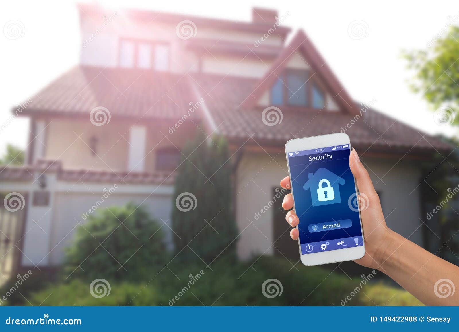 Smartphone with Home Security App in a Hand on the Building Background ...