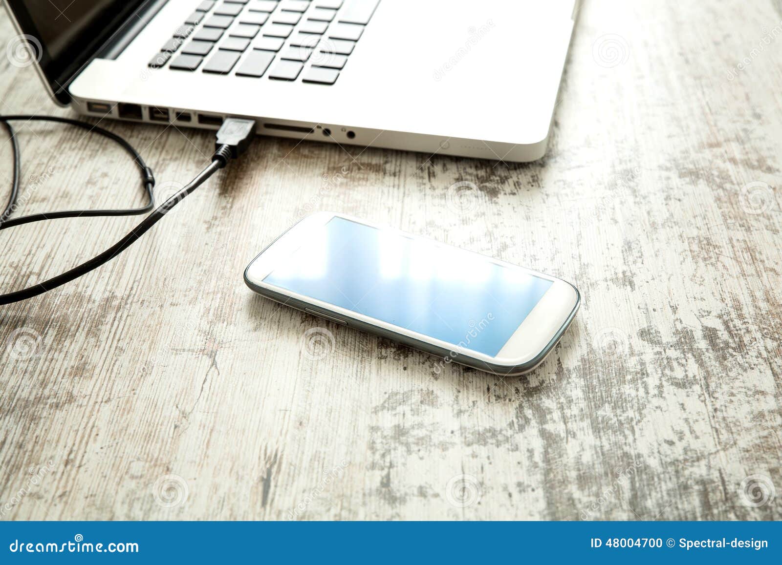 Smartphone and a Laptop Computer on a Desktop Stock Photo - Image of ...