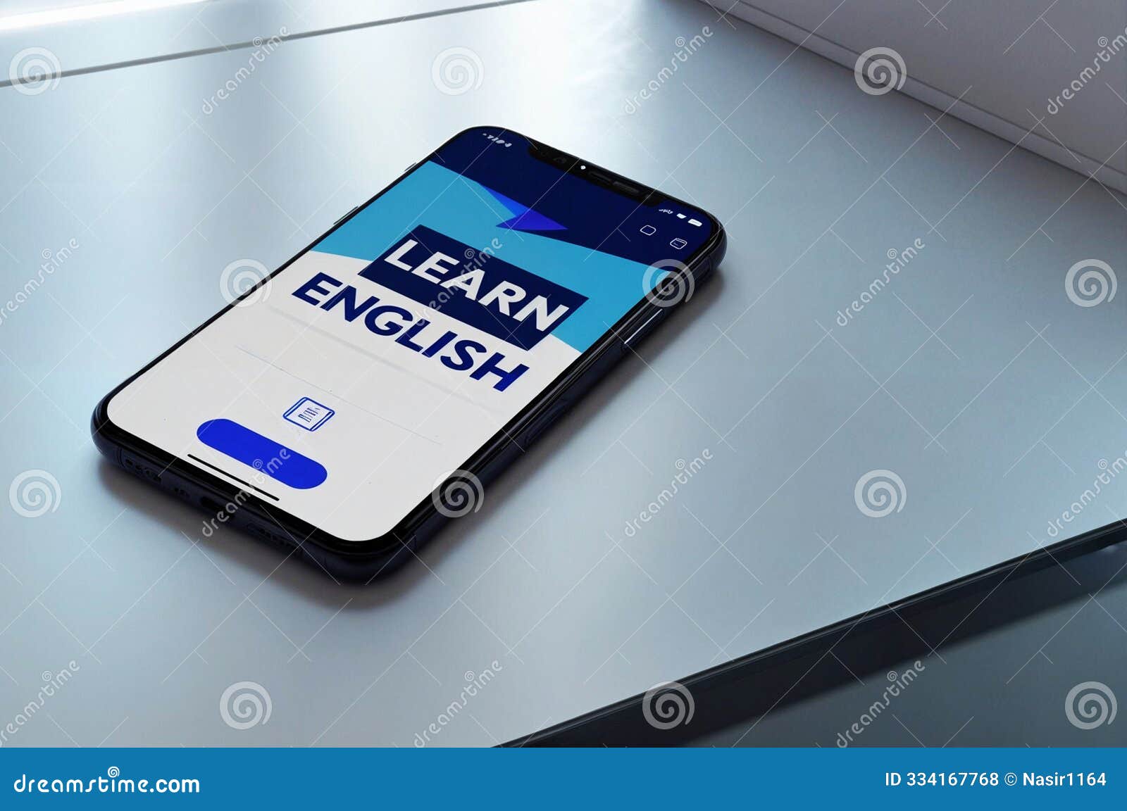 A Smartphone Mobile Phone with a Learning Application Text Word "LEARN ...