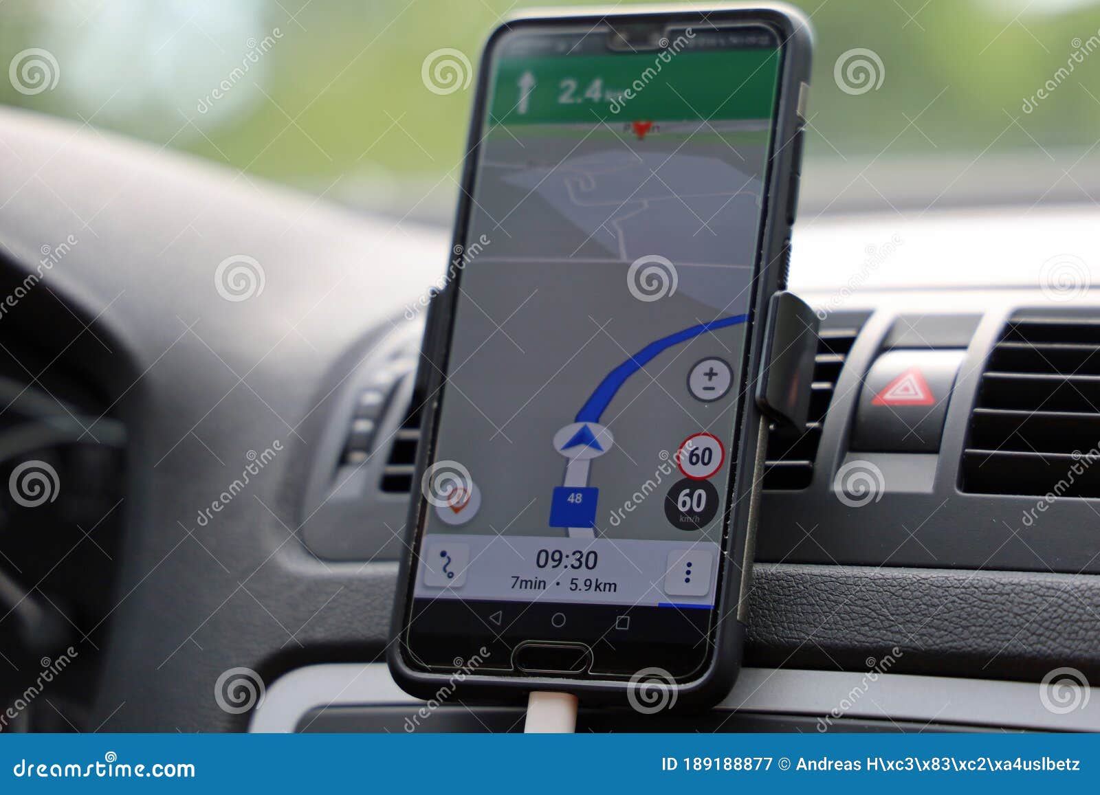 Smartphone with Navigator Map on Dashboard in a Car, Close Up of ...