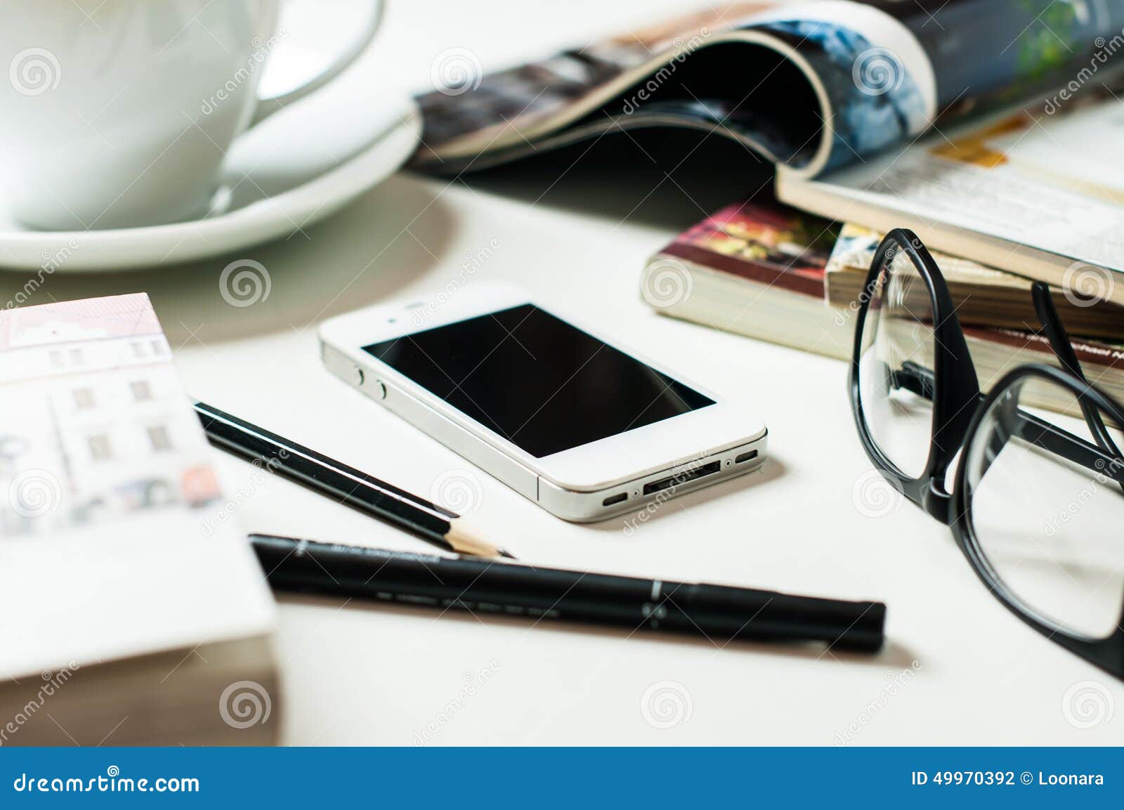 Smartphone on office table stock photo. Image of everyday - 49970392