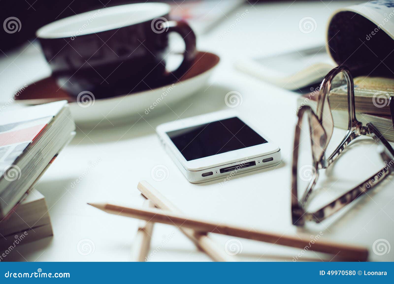 Smartphone on office table stock photo. Image of device - 49970580