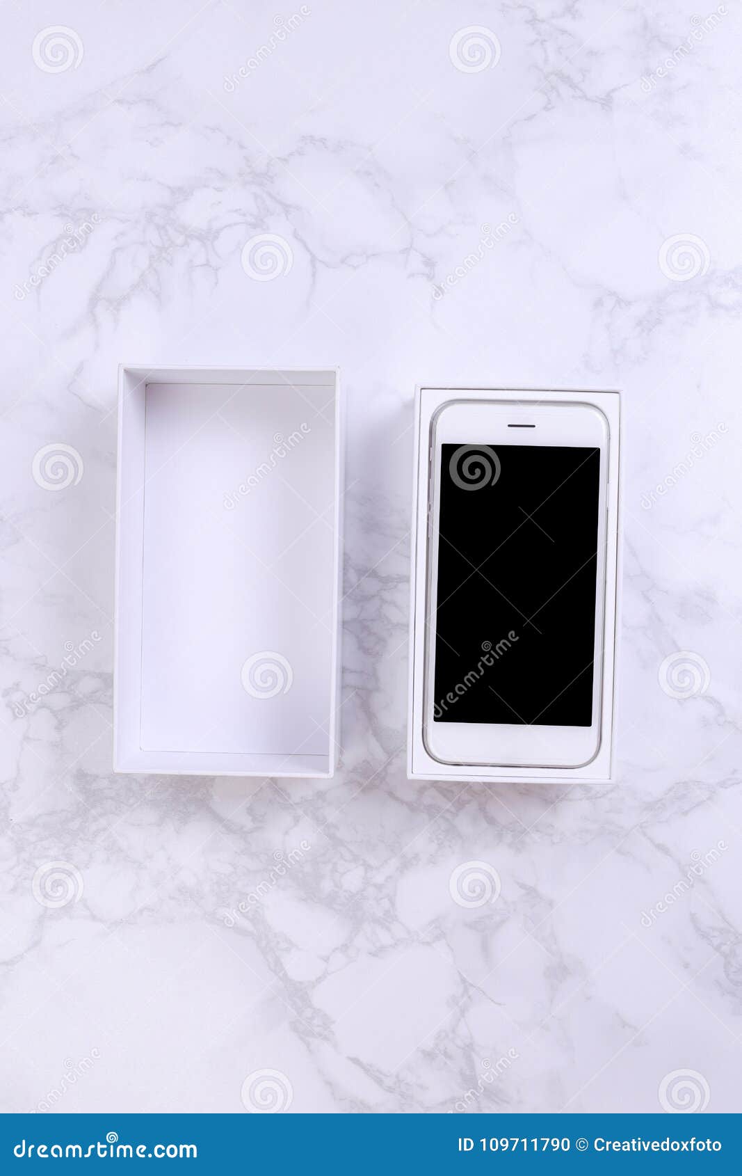 Smartphone with Packaging on Marble Background Stock Photo - Image of ...