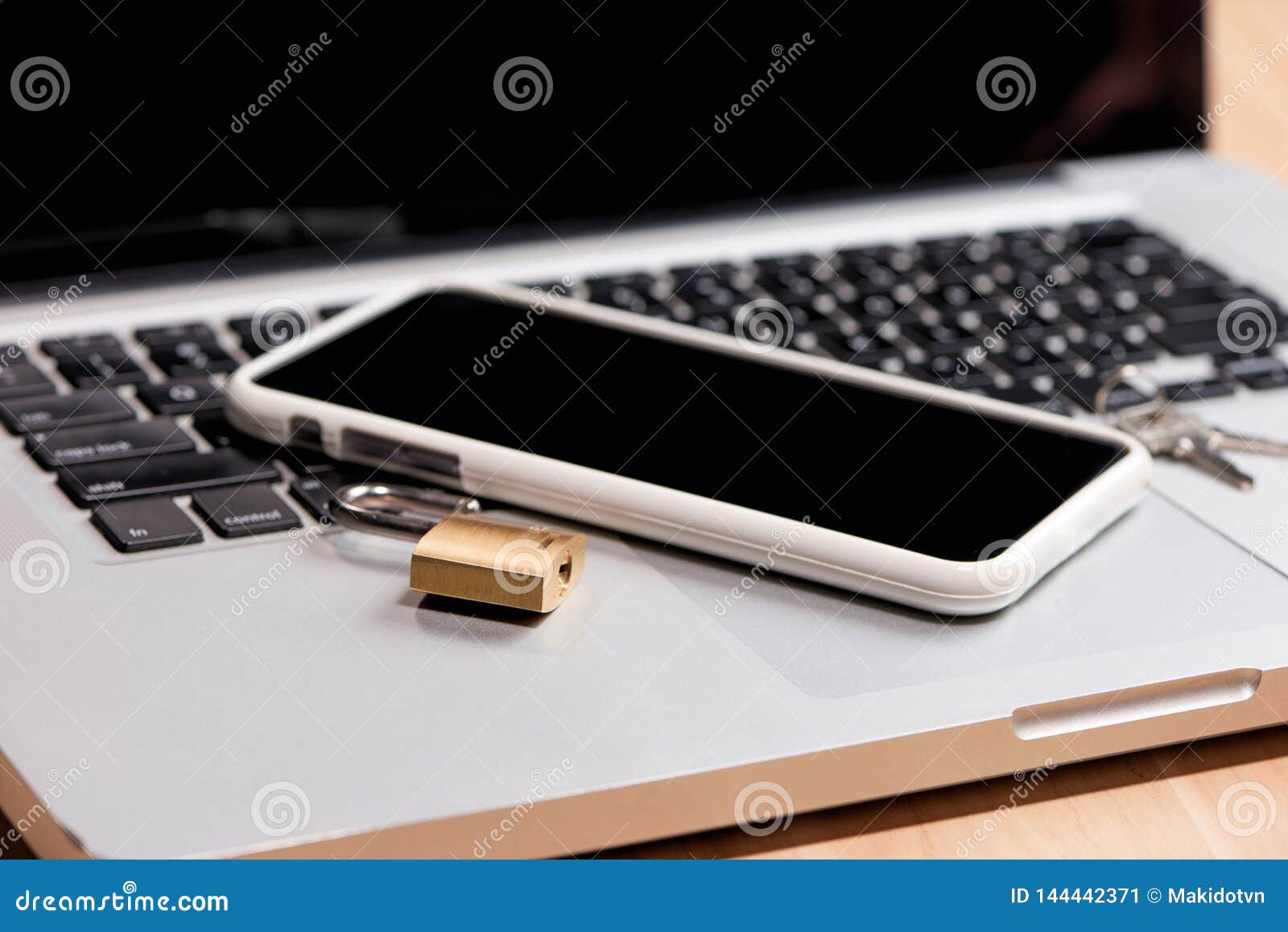 Smartphone and Padlock is Lying on a Laptop Keyboard Stock Image ...