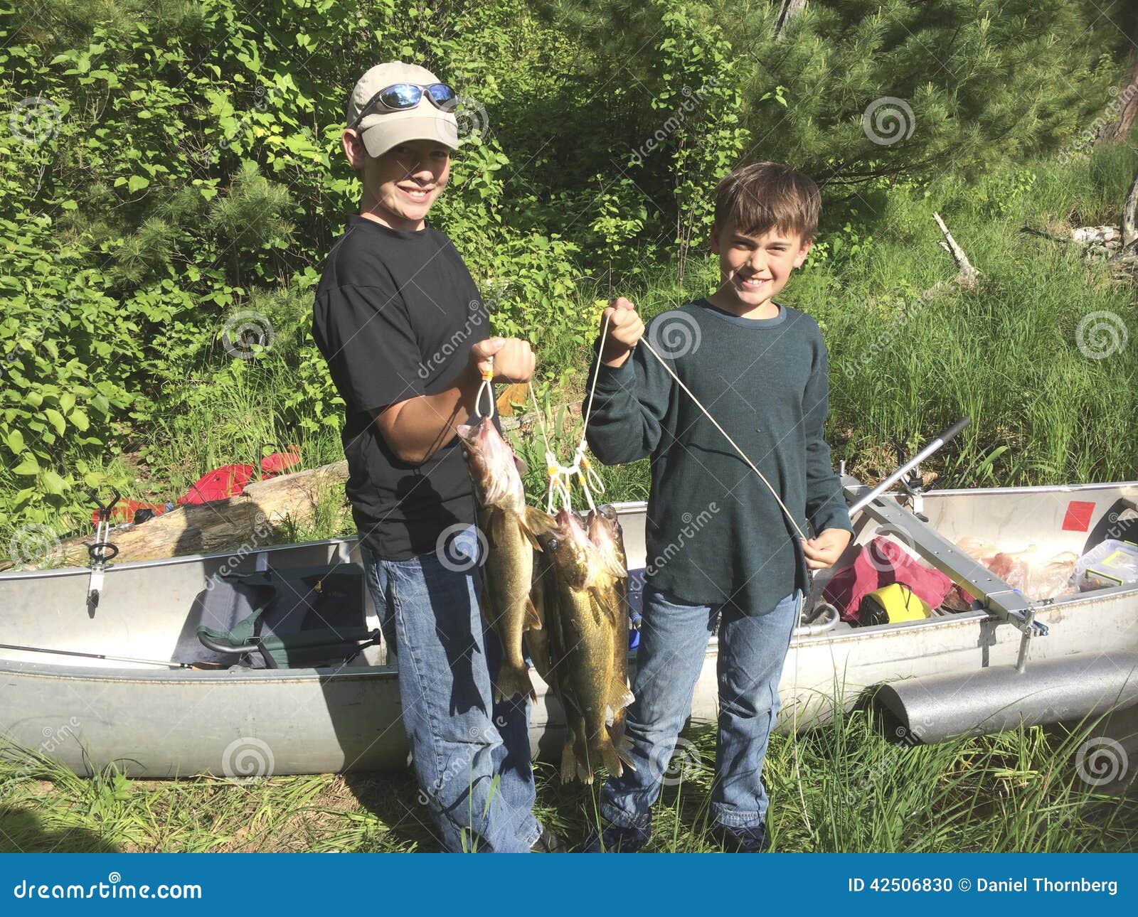 Smartphone Picture of Two Boys Showing Their Catch of Walleyes Stock ...