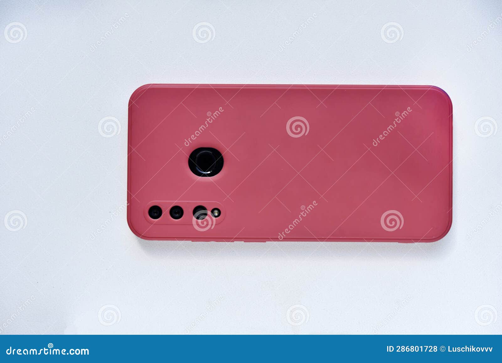 A Smartphone in a Red Case on the Back Side. Phone Camera Stock Photo ...
