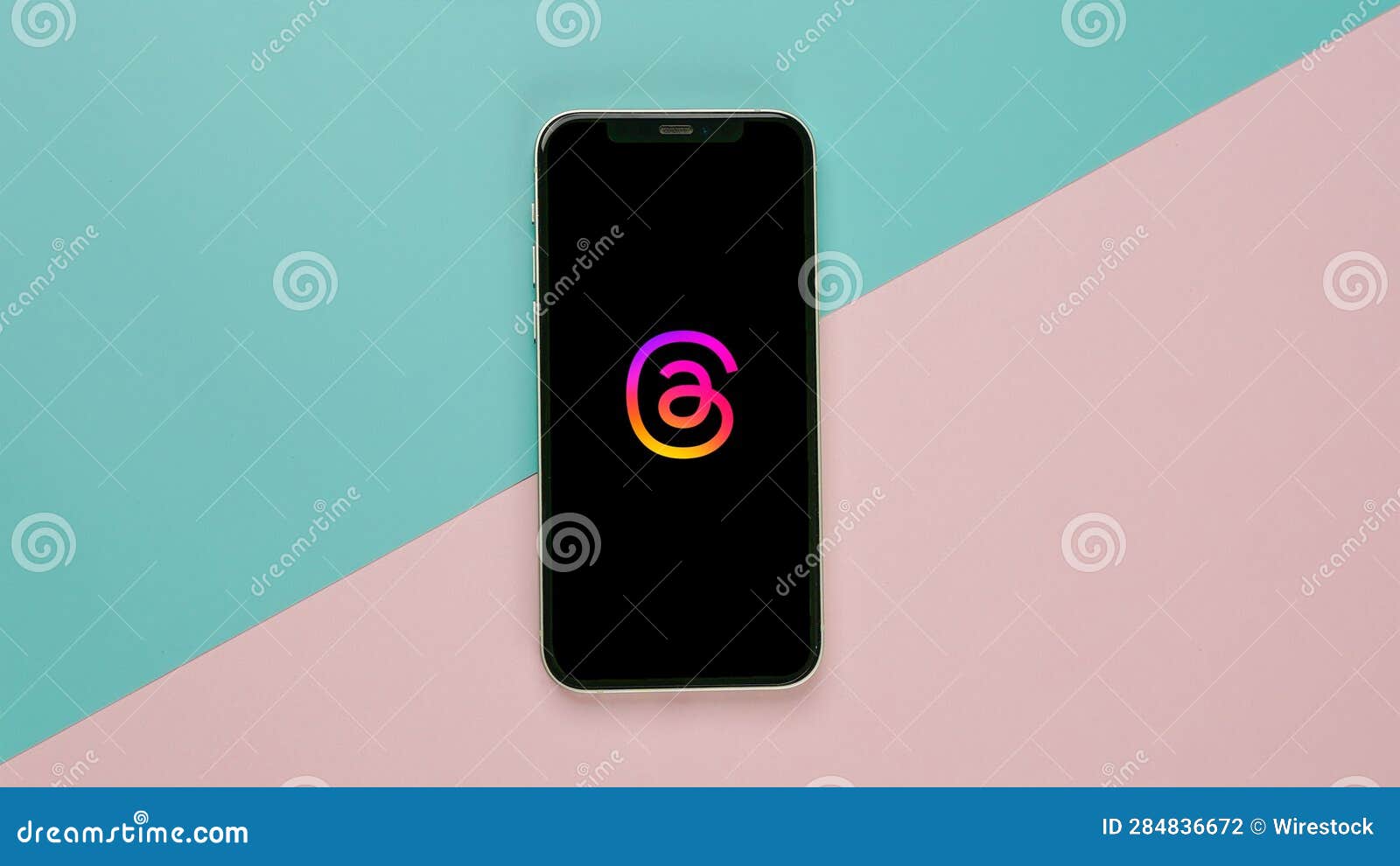 Smartphone Screen with the Threads Meta Logo on a Pink Blue Background ...