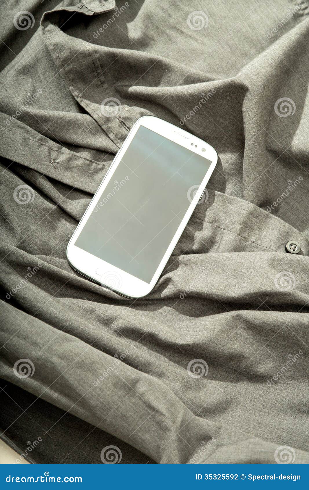 Smartphone on a shirt stock photo. Image of cotton, casual - 35325592
