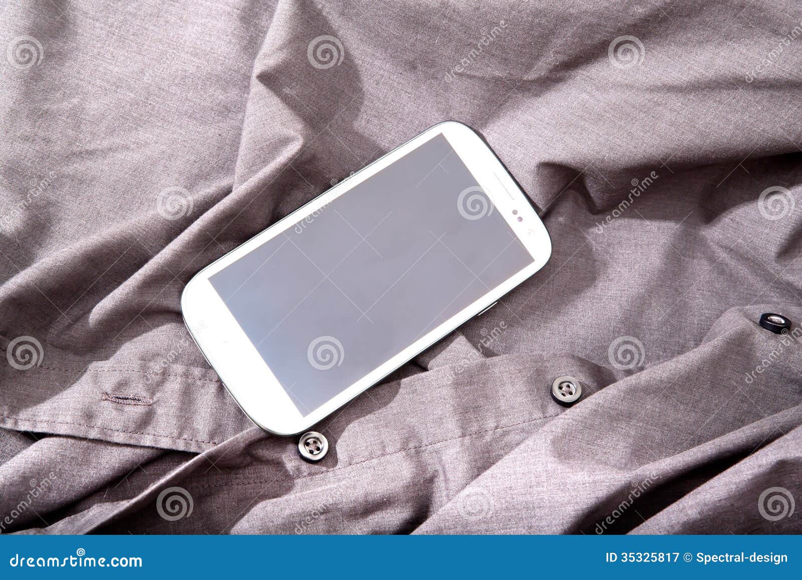 Smartphone on a shirt stock image. Image of portable - 35325817