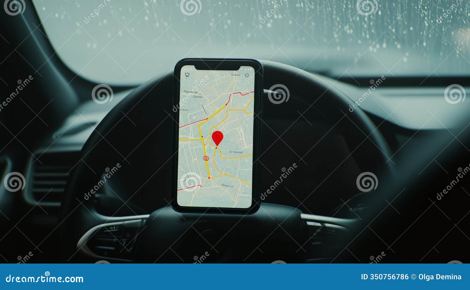 Smartphone Showing Navigation Map on Car Dashboard during Rainy Day ...