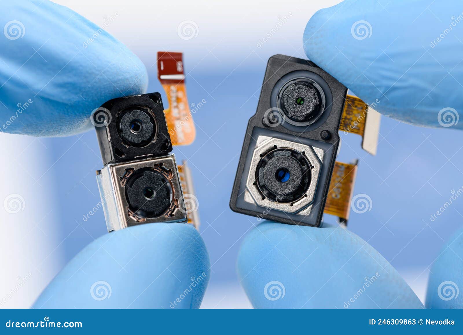Smartphone Single and Dual Camera Modules in Scientist Hands Stock ...