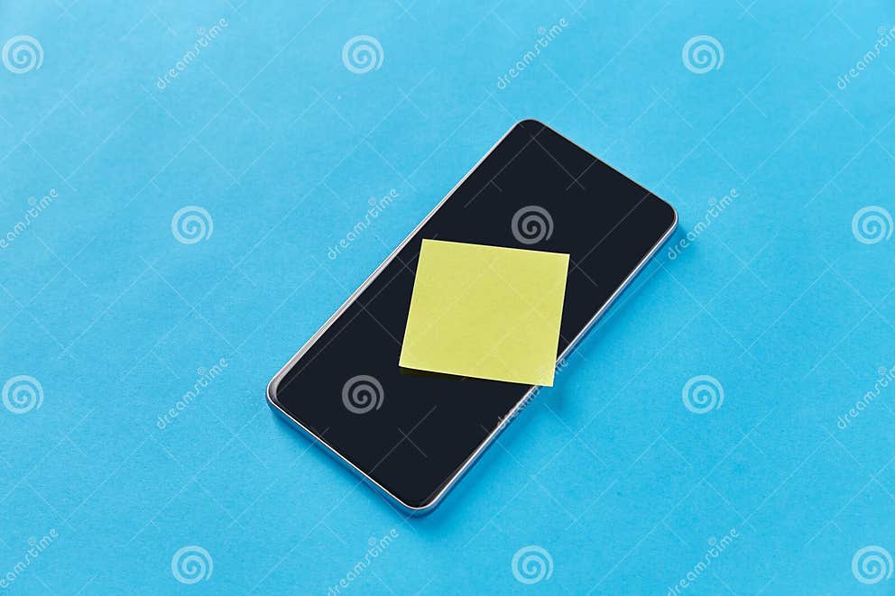 Smartphone with Sticky Note on Blue Background Stock Image - Image of ...