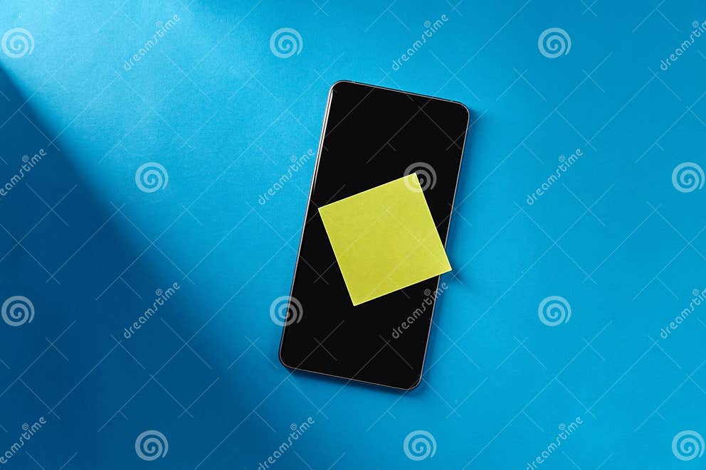 Smartphone with Sticky Note on Blue Background Stock Image - Image of ...