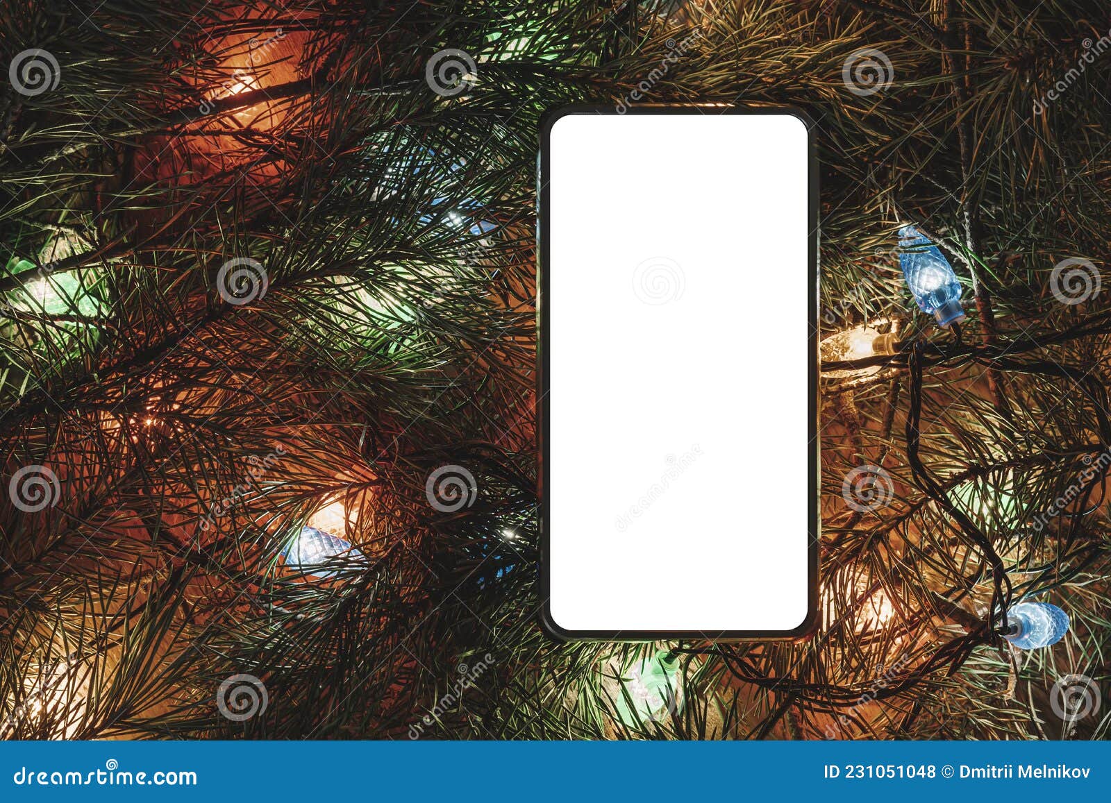 Smartphone Surrounded by Christmas Tree and Accessories. Smartphone ...