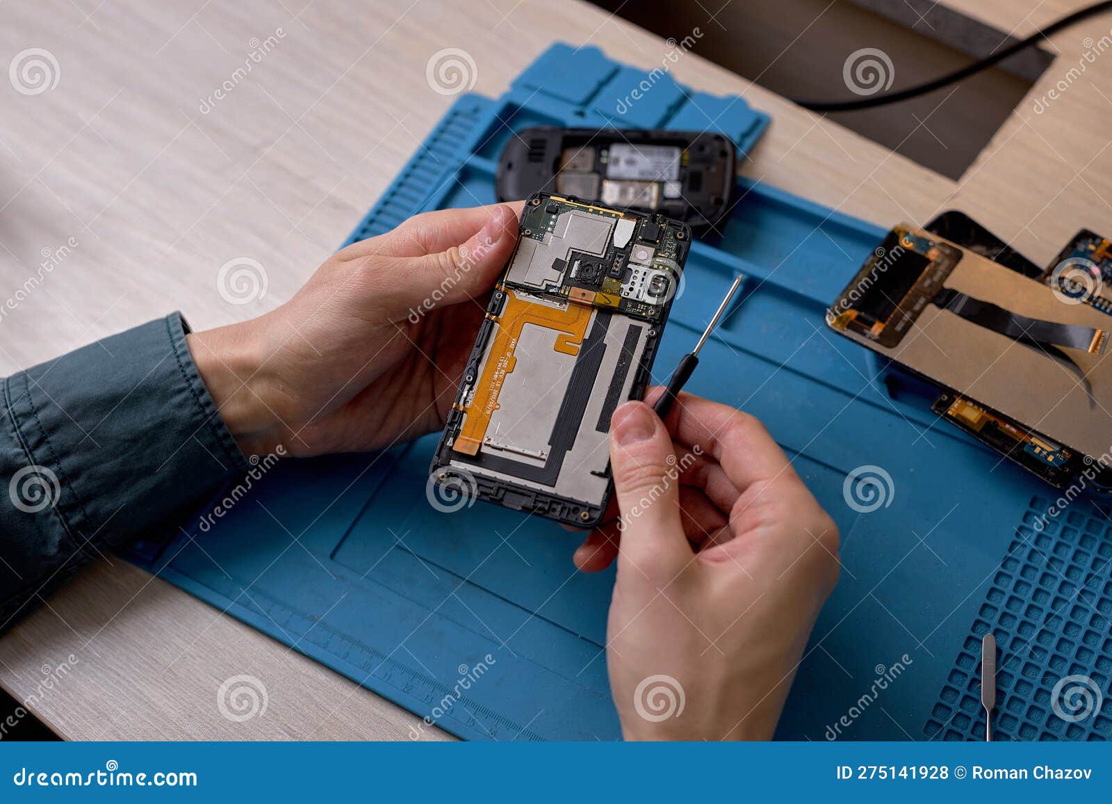 Smartphone Technician Checking a Phone& X27;s Components after ...
