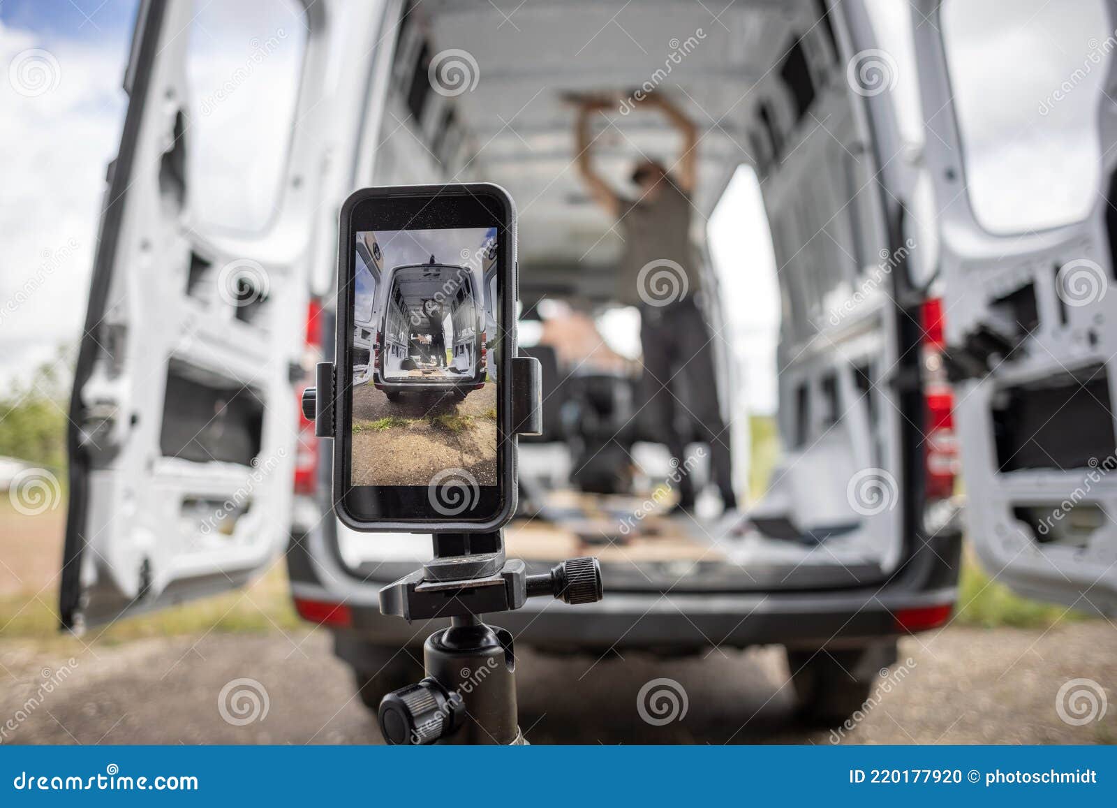 Smartphone on a Tripod in Front of a Van Stock Photo - Image of work ...