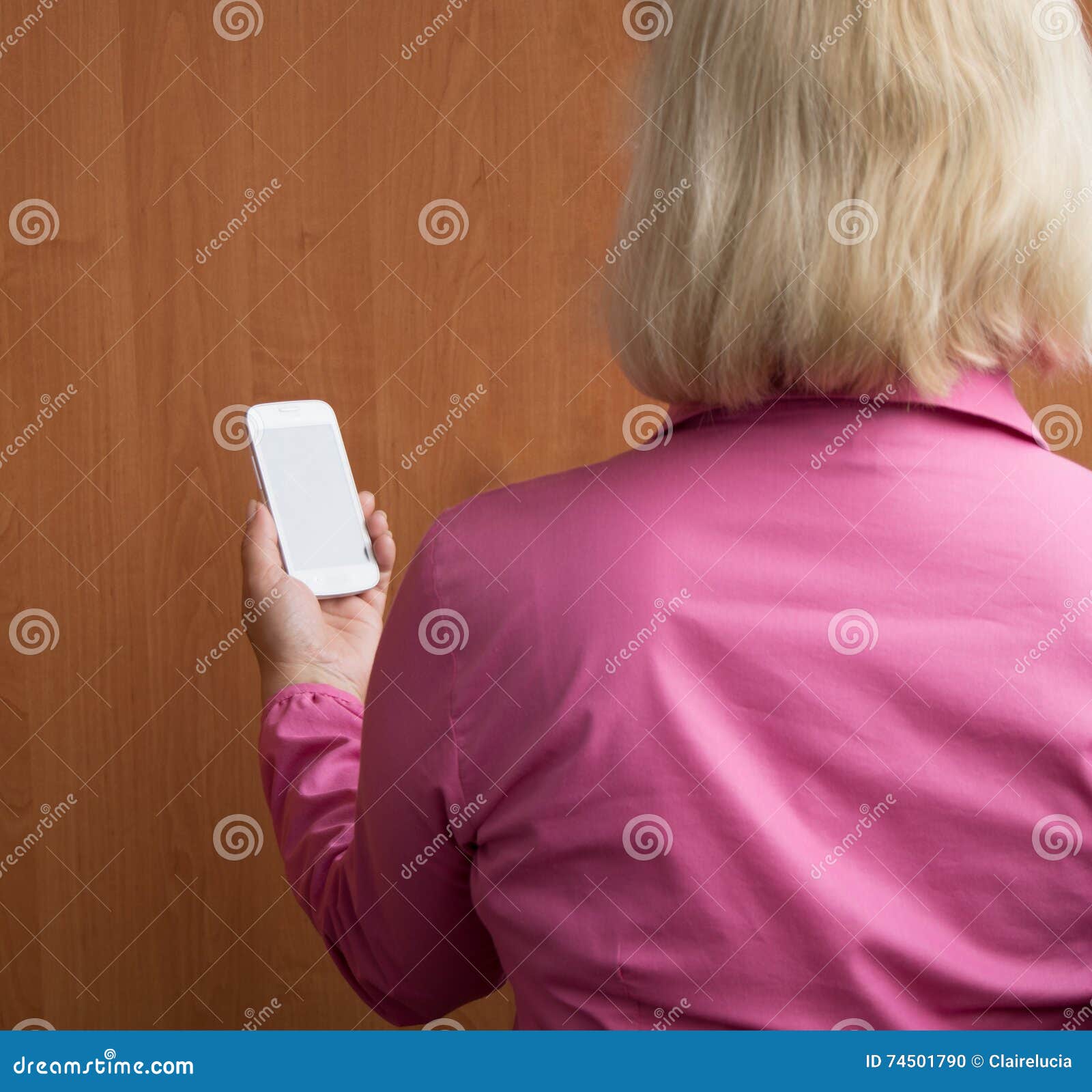 Smartphone Viewing in the Hand of a Young Woman. Selective Focus on the ...