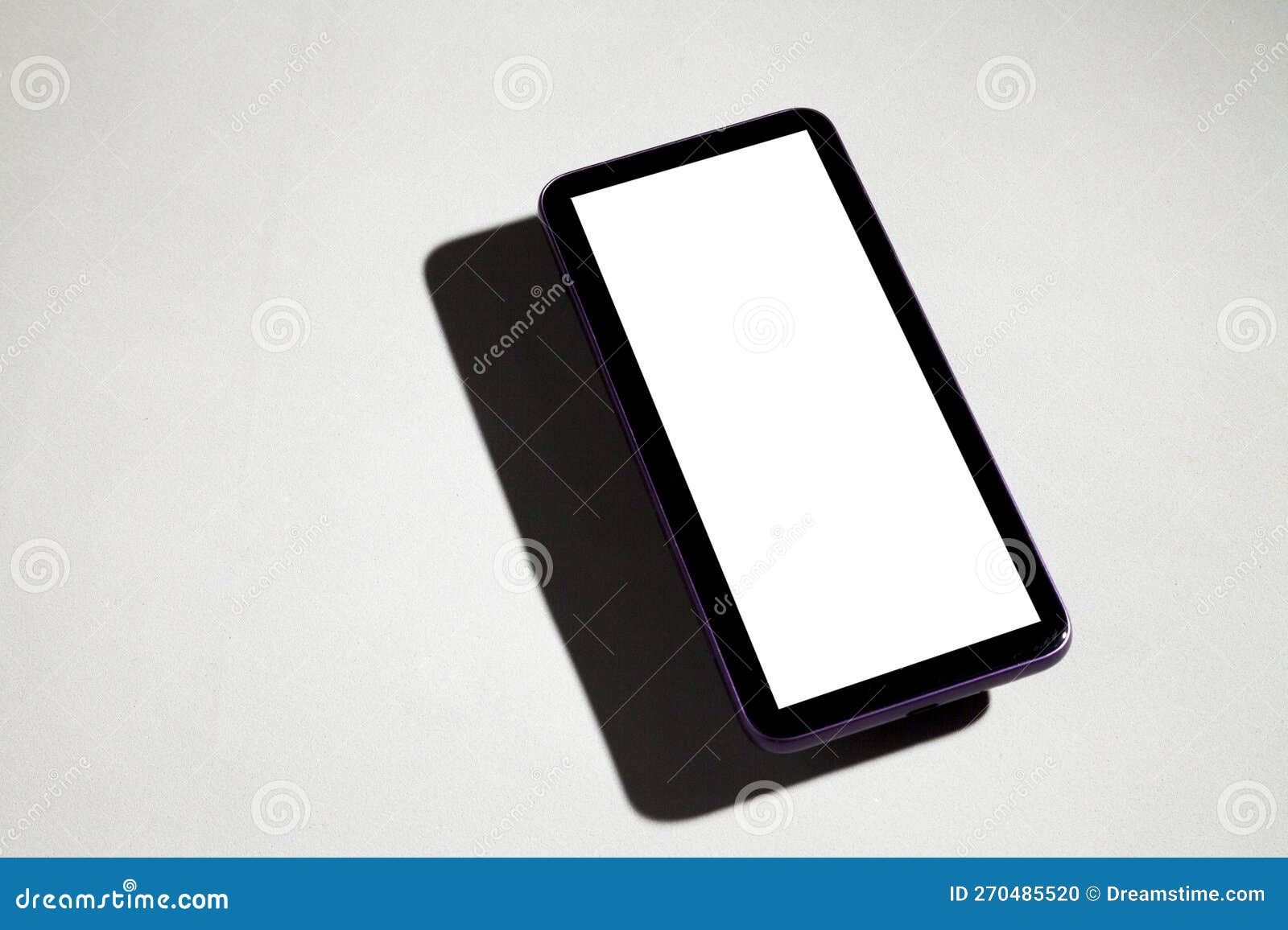 Smartphone with White Screen on Top of Gray Table. Stock Photo - Image ...