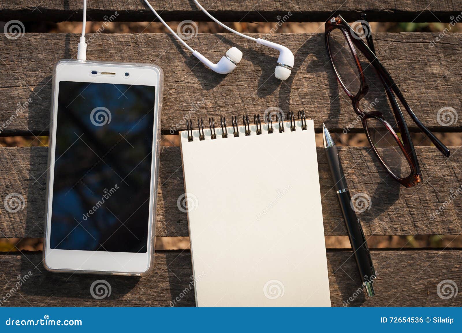 Smartphone on wood table stock photo. Image of internet - 72654536