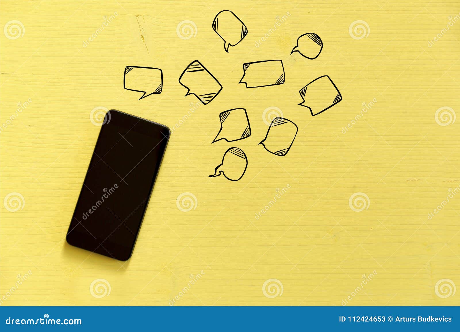 Smartphone on Yellow Background with Text Bubbles Around. Messag Stock ...