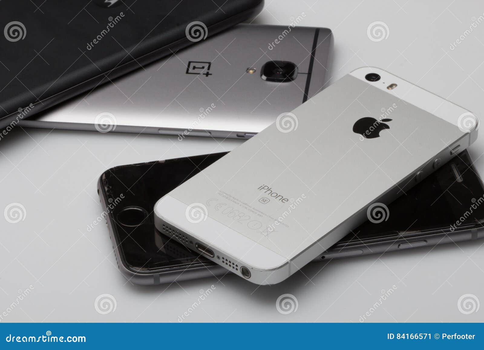 Smartphones are Placed One To Another, Laying on the Table Side is ...