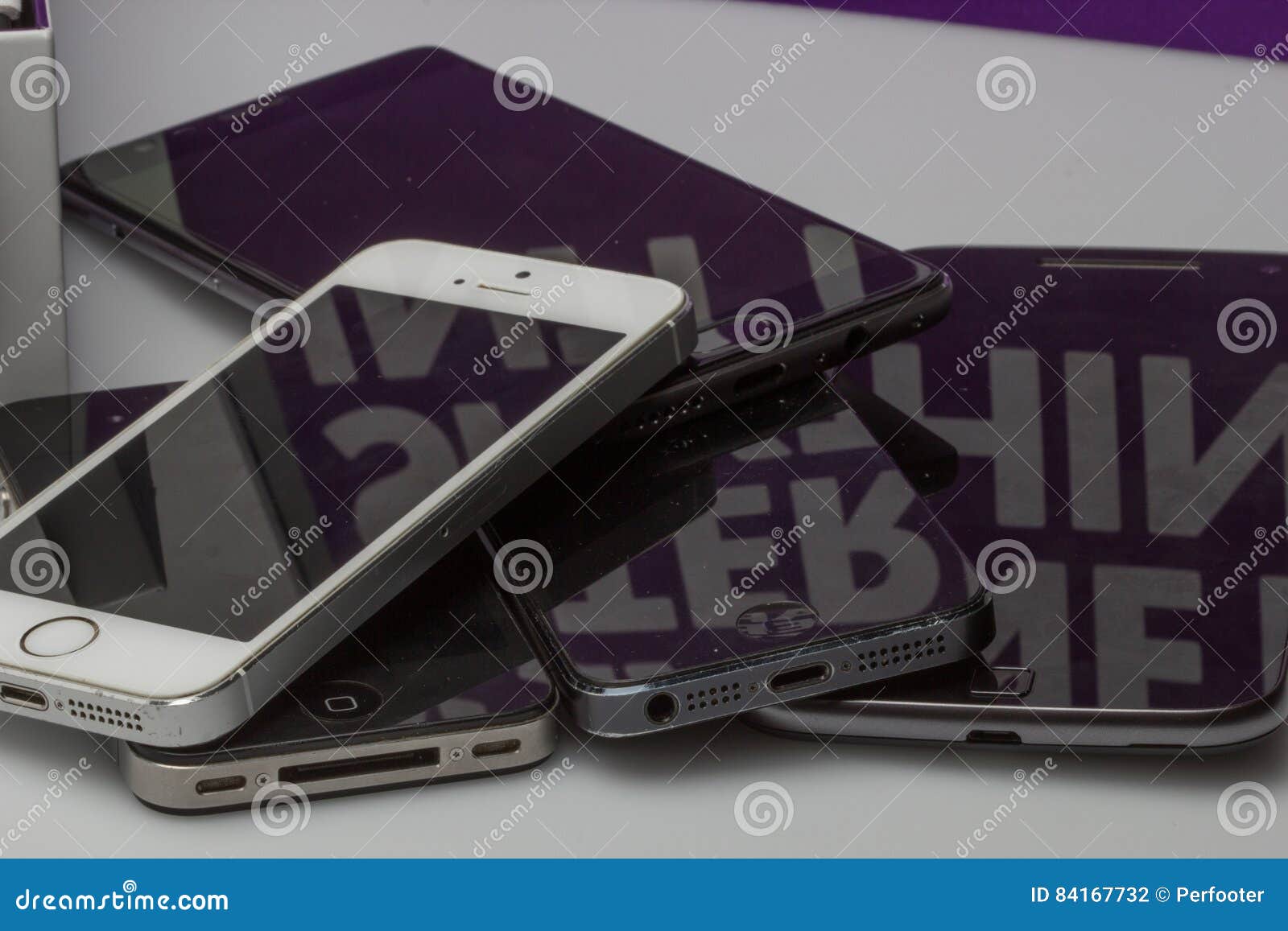 Smartphones are Placed One To Another, Laying on the Table Side is ...