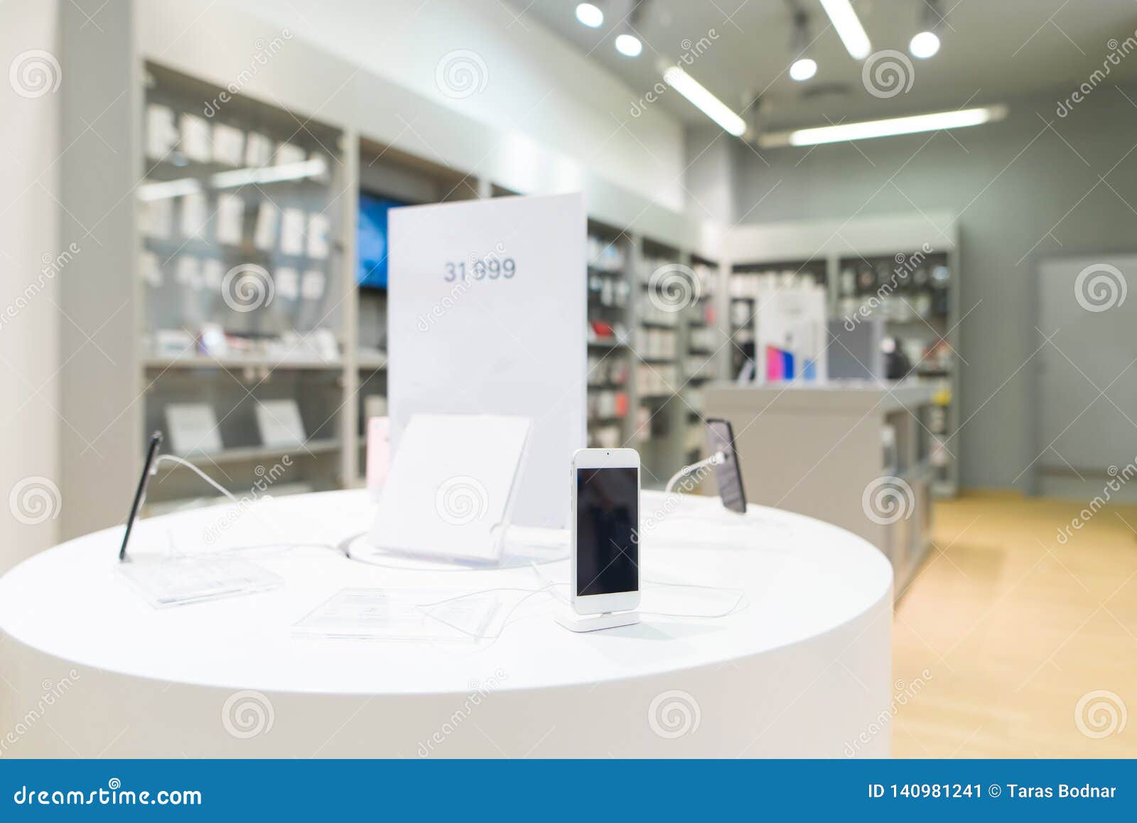 Smartphones on a Showcase in a Modern Electronics Store.Smartphone on ...