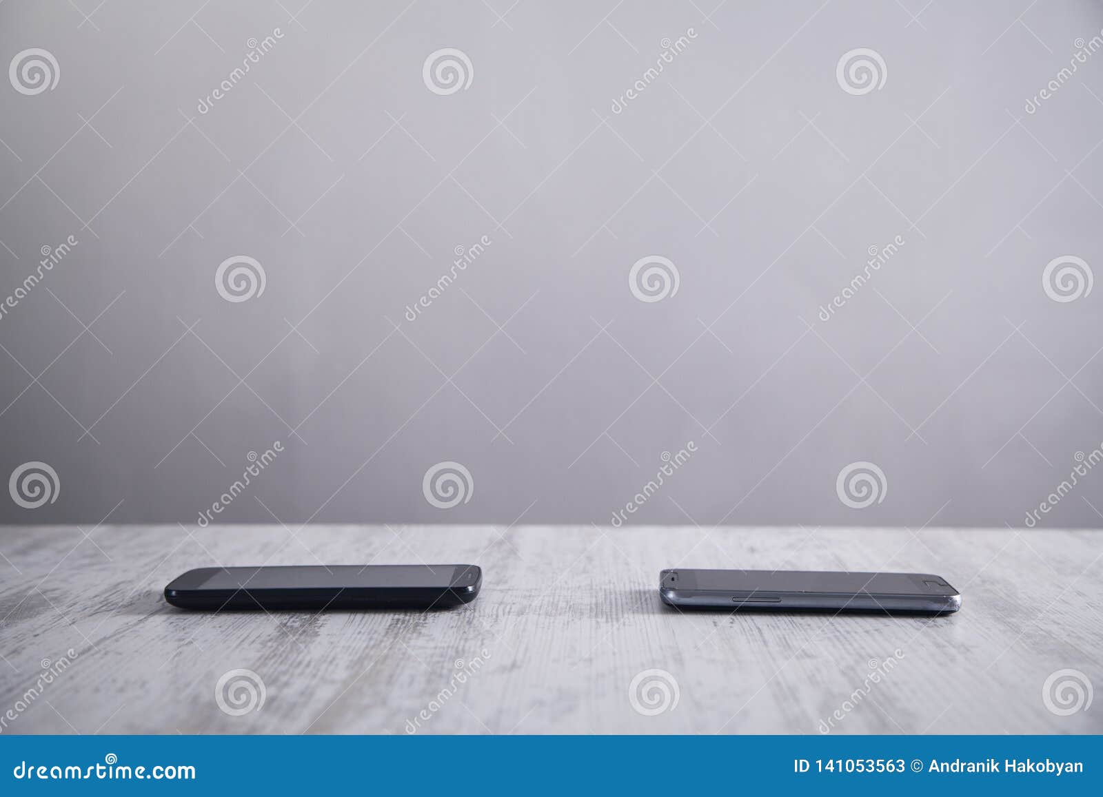 Smartphones on White Modern Desk Stock Image - Image of smartphones ...