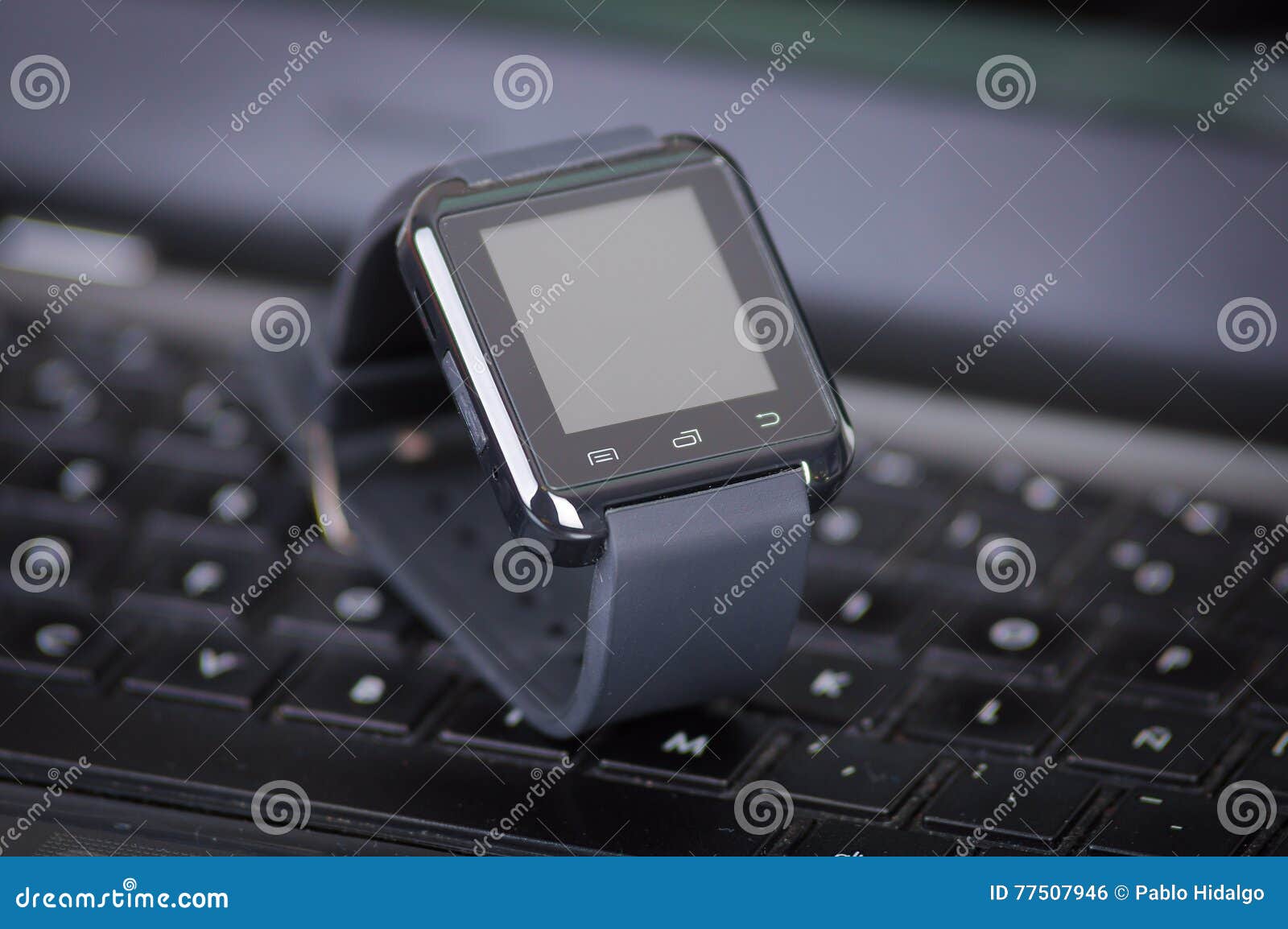 Smartwatch with Screen Lit Up Sitting on Top of Computer Keyboard, Very ...