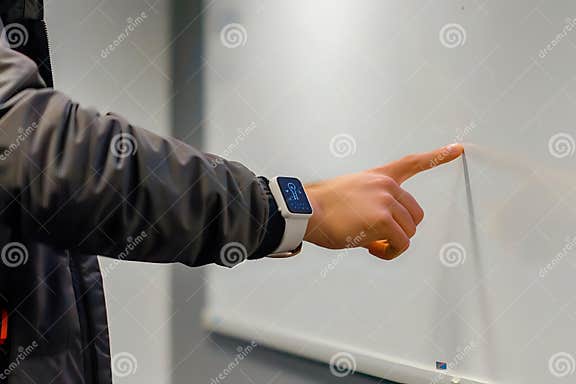 Smartwatch User Interacts with Digital Interface on Whiteboard ...