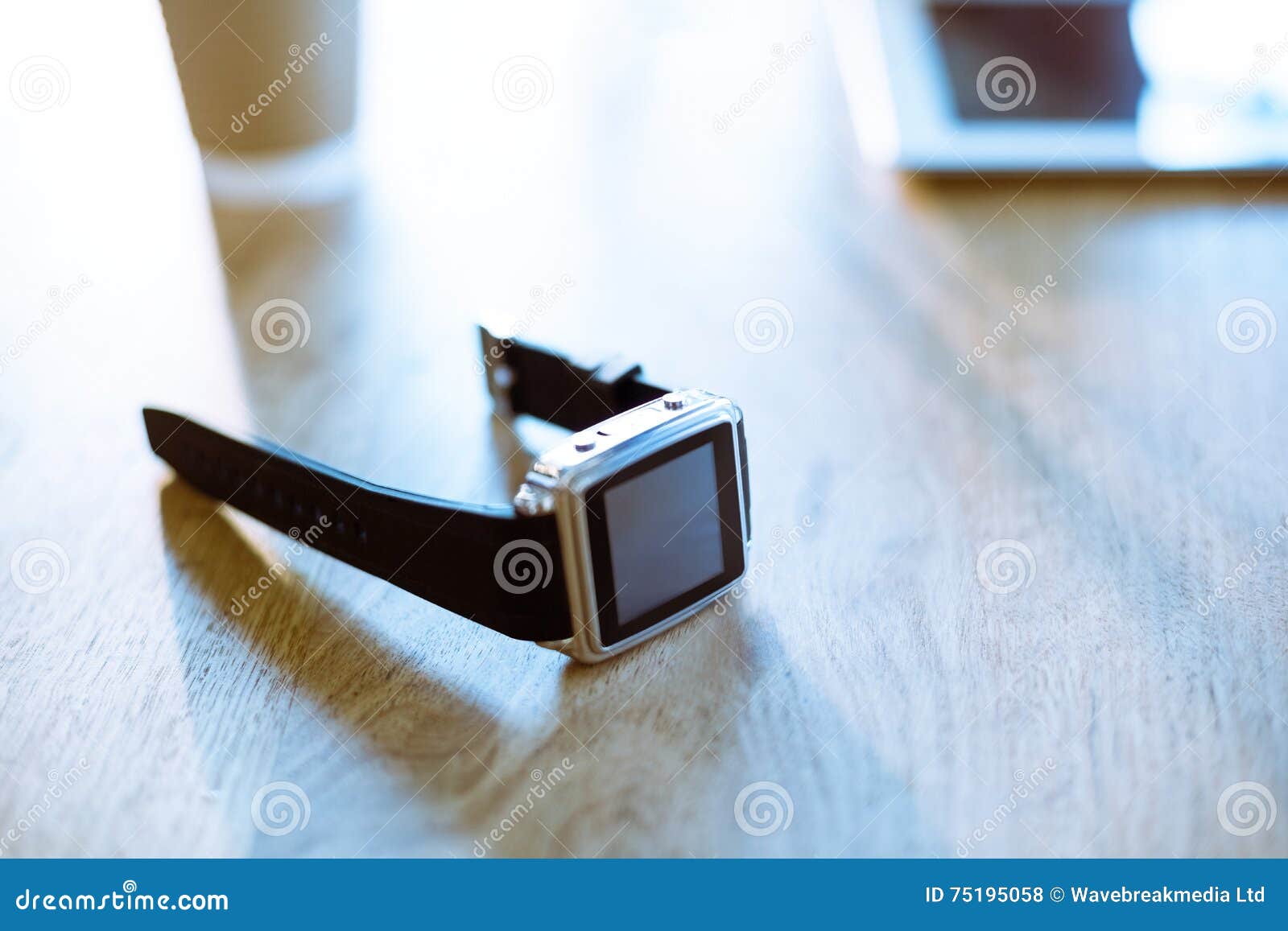 Smartwatch on wooden table stock photo. Image of people - 75195058
