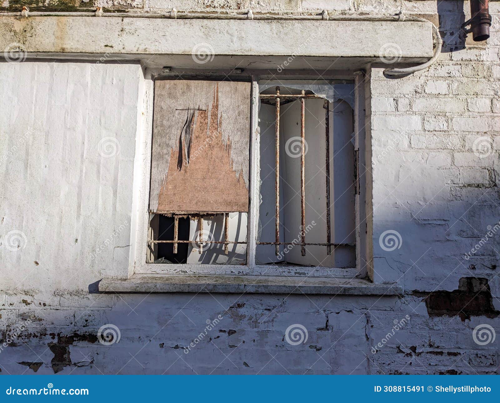 Smashed Broken Window with Chipped Wall Down an AlleyWay Abandoned ...