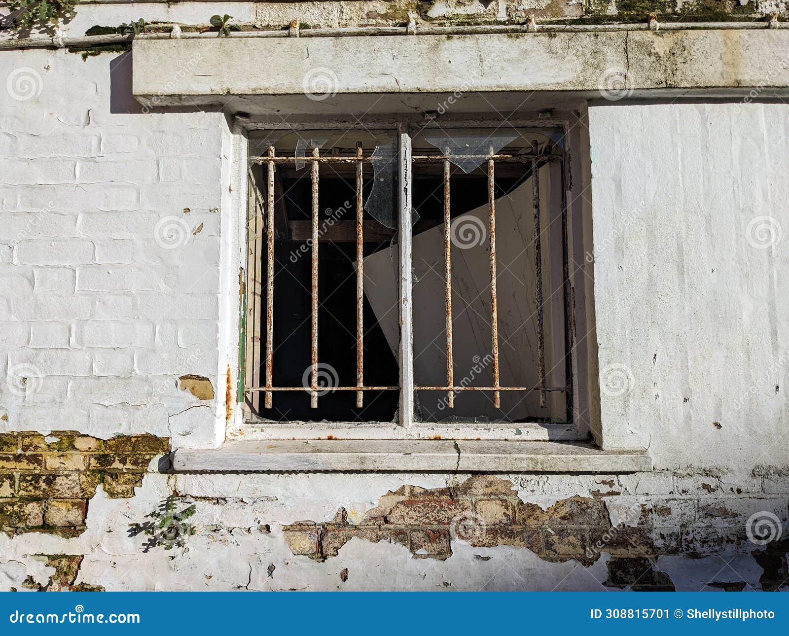 Smashed Broken Window with Chipped Wall Down an AlleyWay Abandoned ...