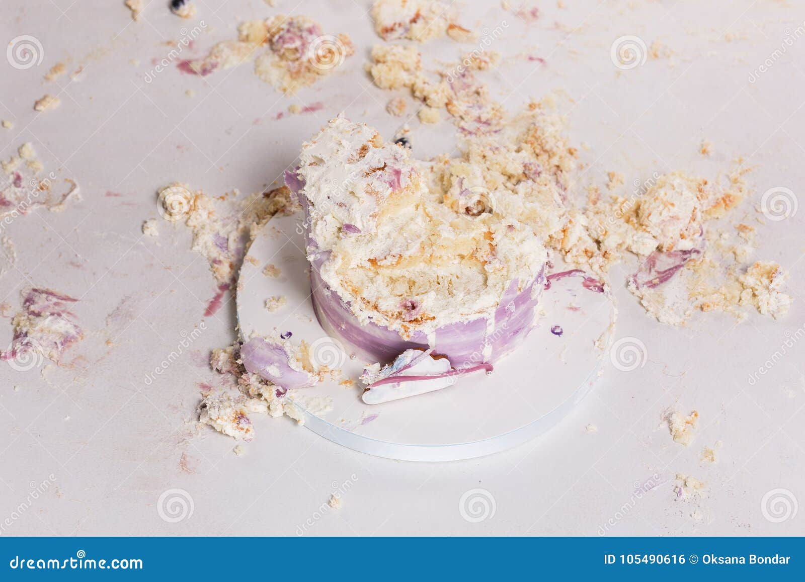 Smashed Cake on White Table for First Birthday. Messy Pieces Stock ...