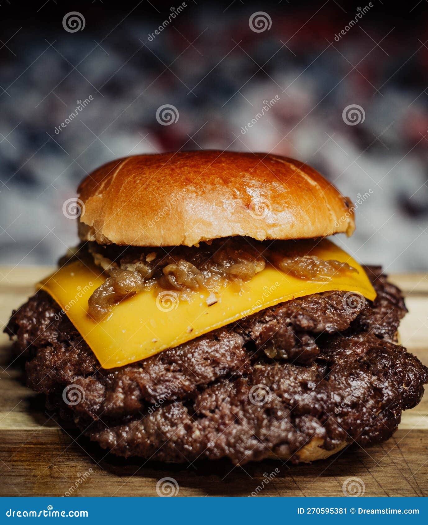 Smashed Cheeseburger on a Wooden Table in Front of a Fireplace. Stock ...